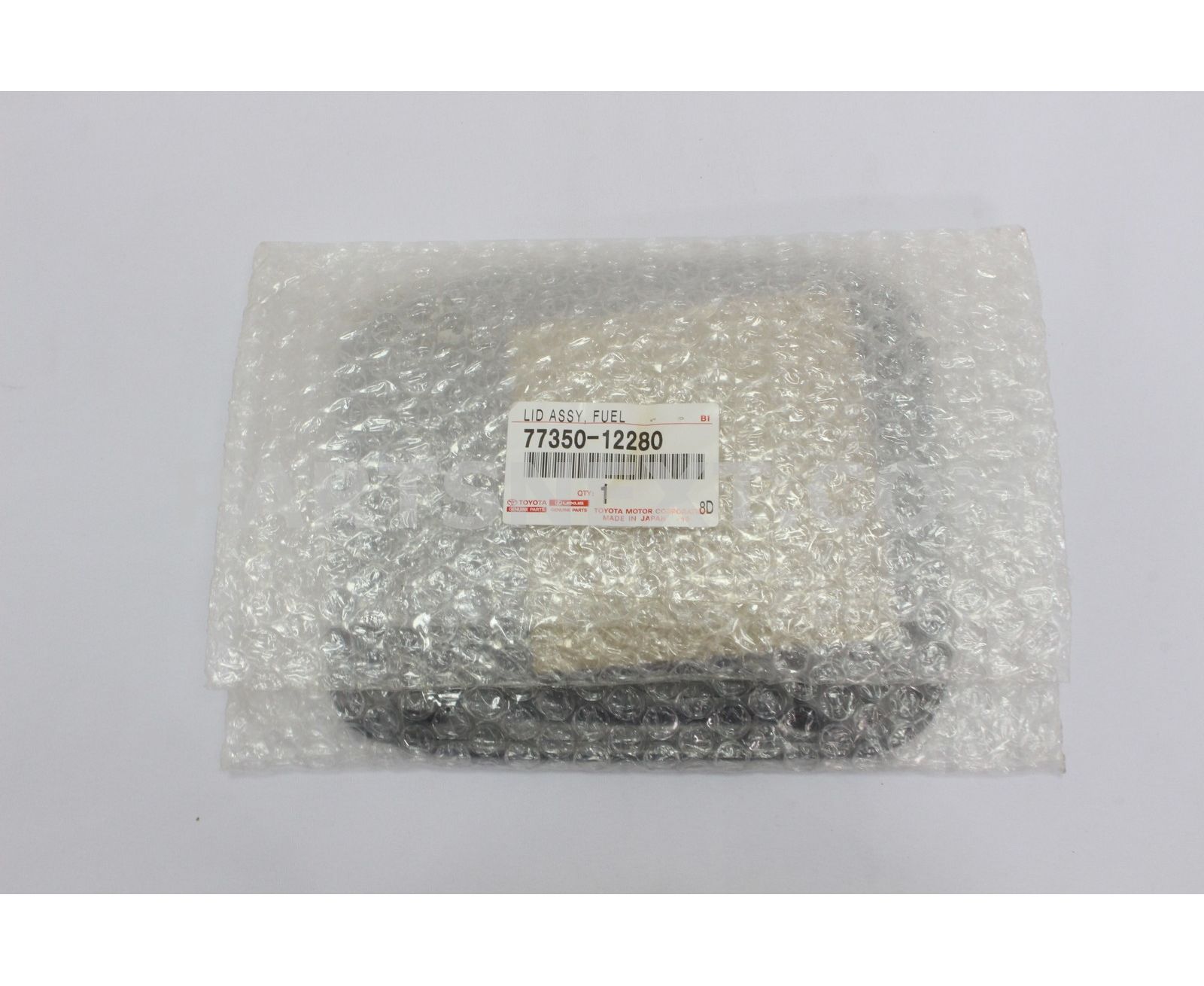 Toyota :: 77350-12280 LID ASSY, FUEL FILLER OPENING